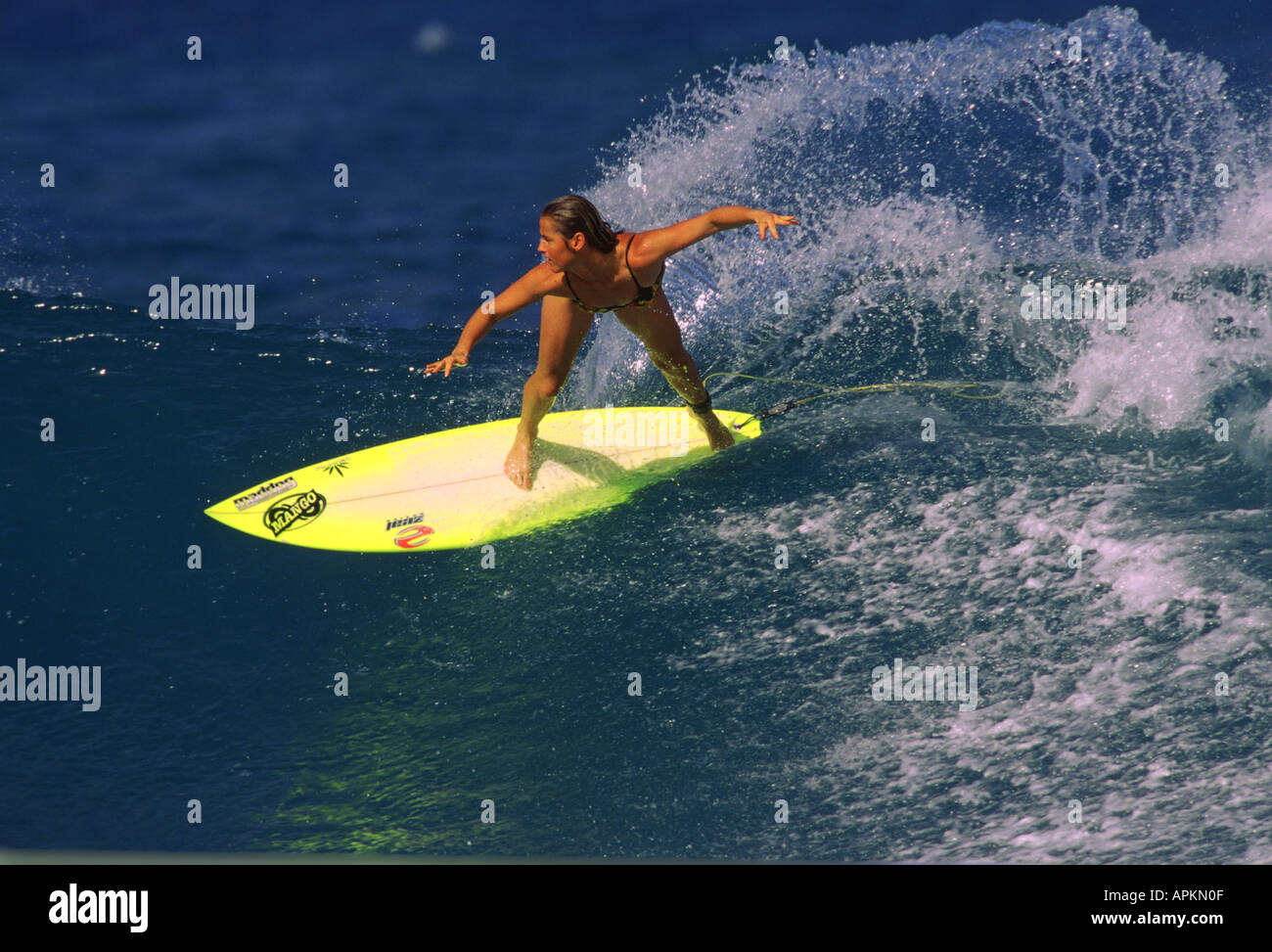 FEMALE SURFING ACTION Stock Photo - Alamy