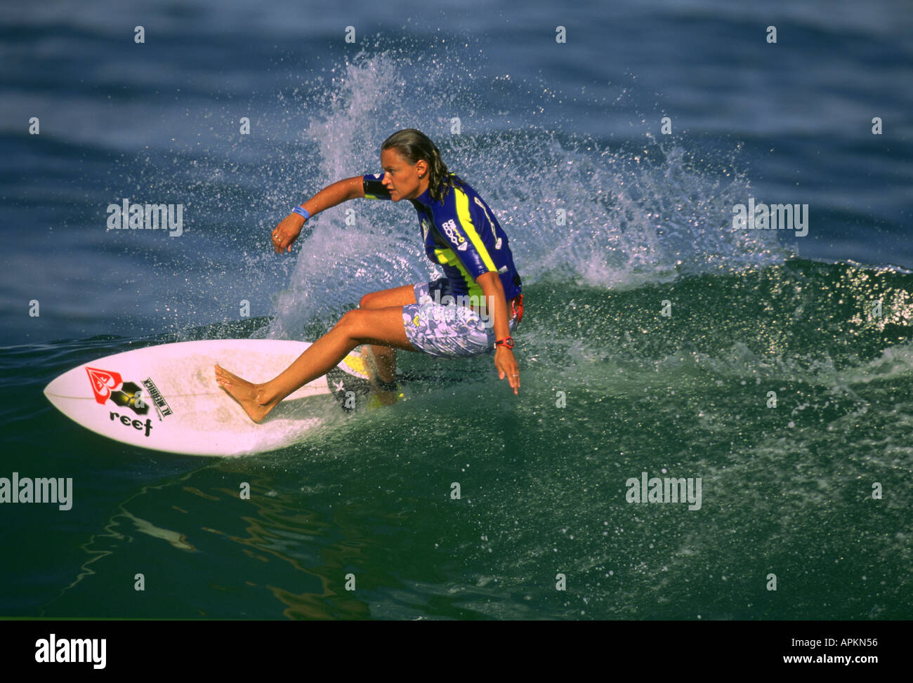 Surfing wetsuit girl hi-res stock photography and images - Alamy