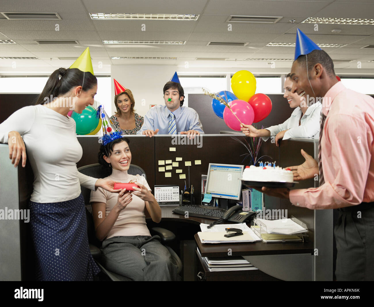 Office workers having birthday party Stock Photo - Alamy