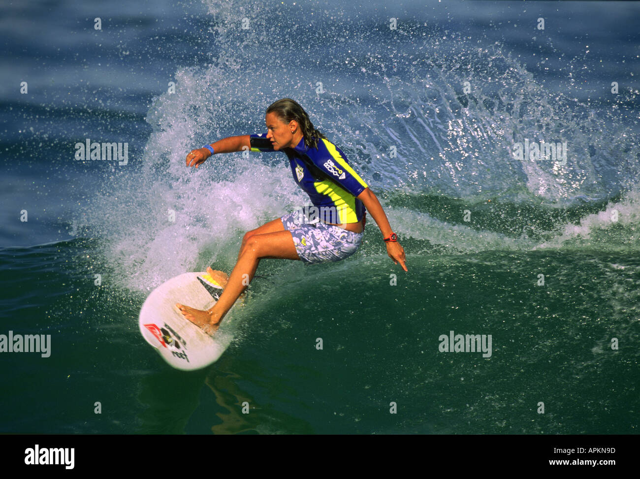 FEMALE SURFING ACTION Stock Photo - Alamy