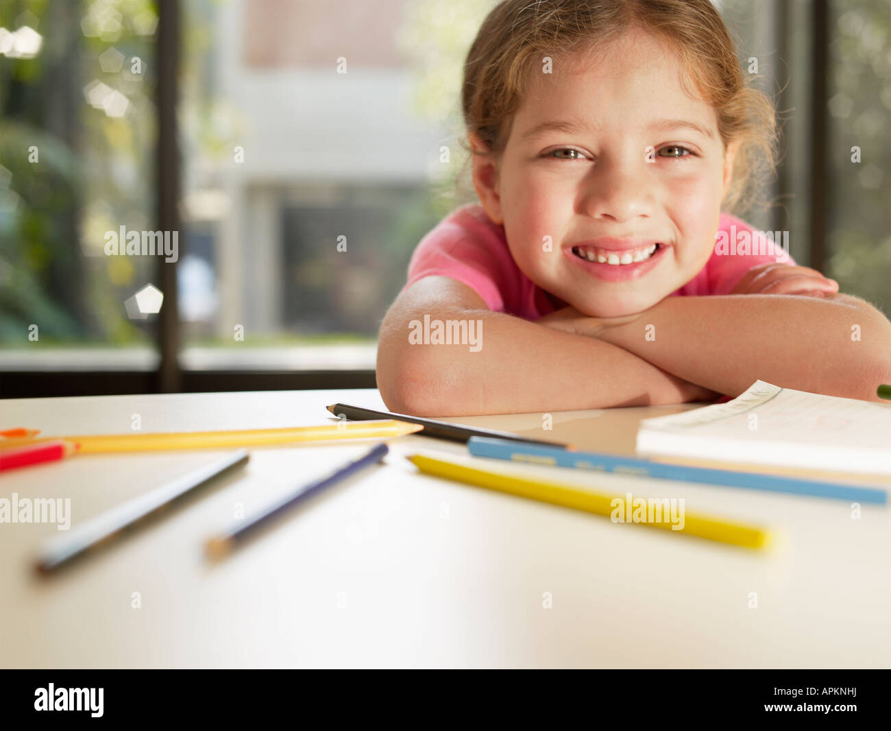 Girl with colored pencils and notepad (portrait Stock Photo - Alamy