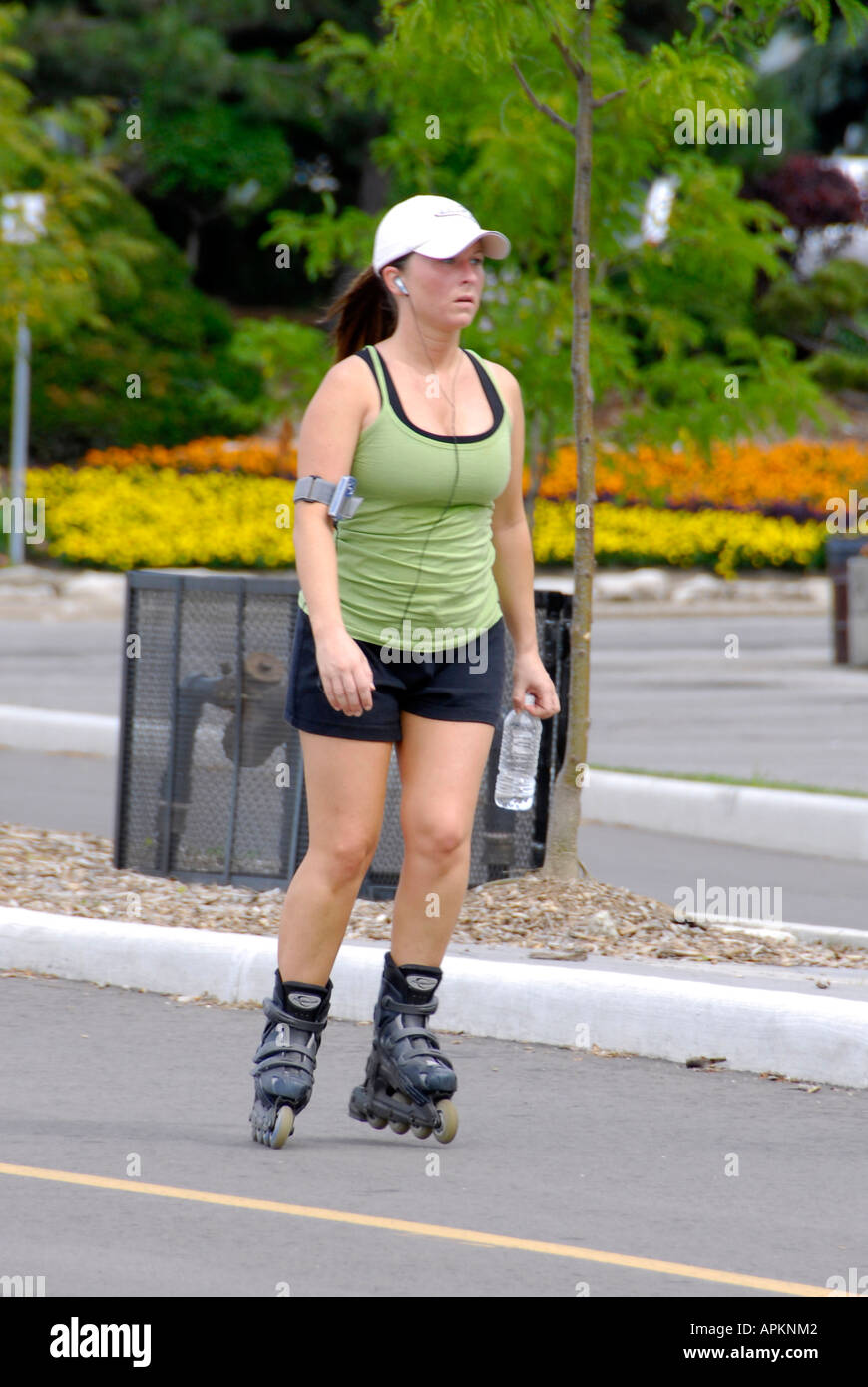 Female Rollerblading for exercise Stock Photo - Alamy