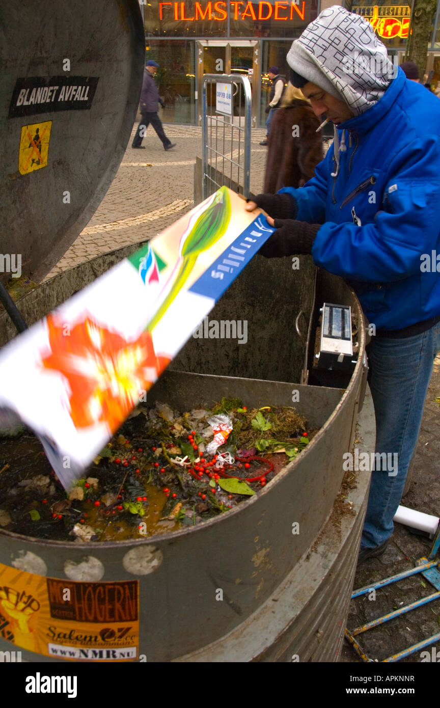 Man binning trash at Hötorget square in Stockholm Sweden EU Stock Photo ...