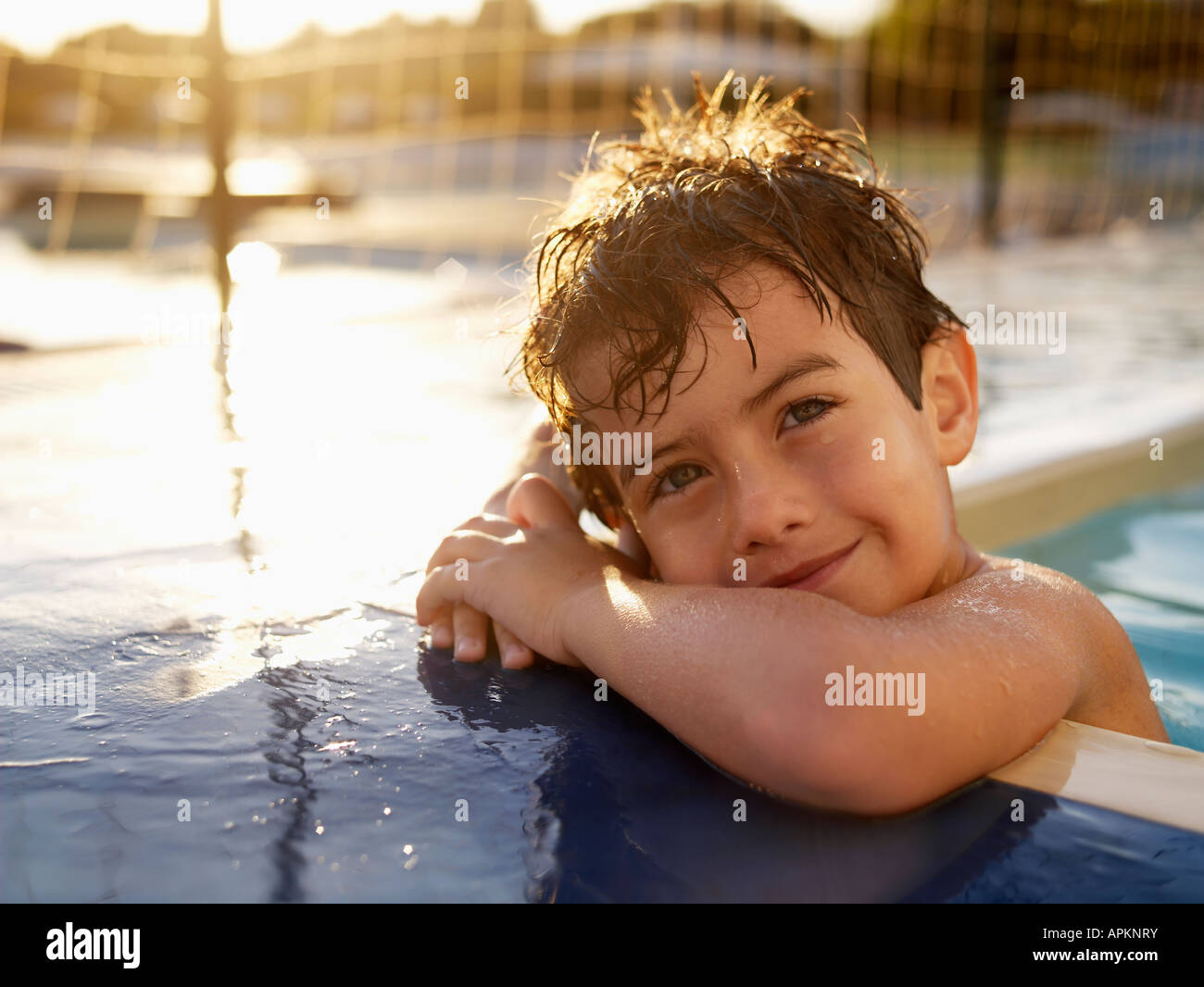Boy in swimming pool (portrait Stock Photo - Alamy