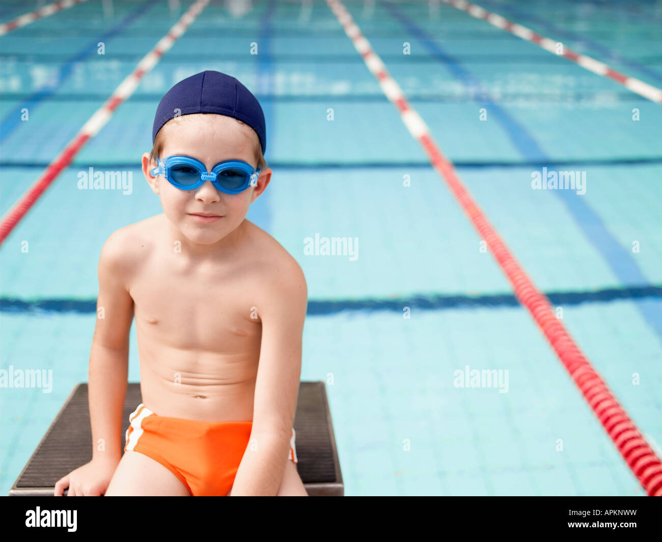 Boy at swimming pool (portrait Stock Photo - Alamy