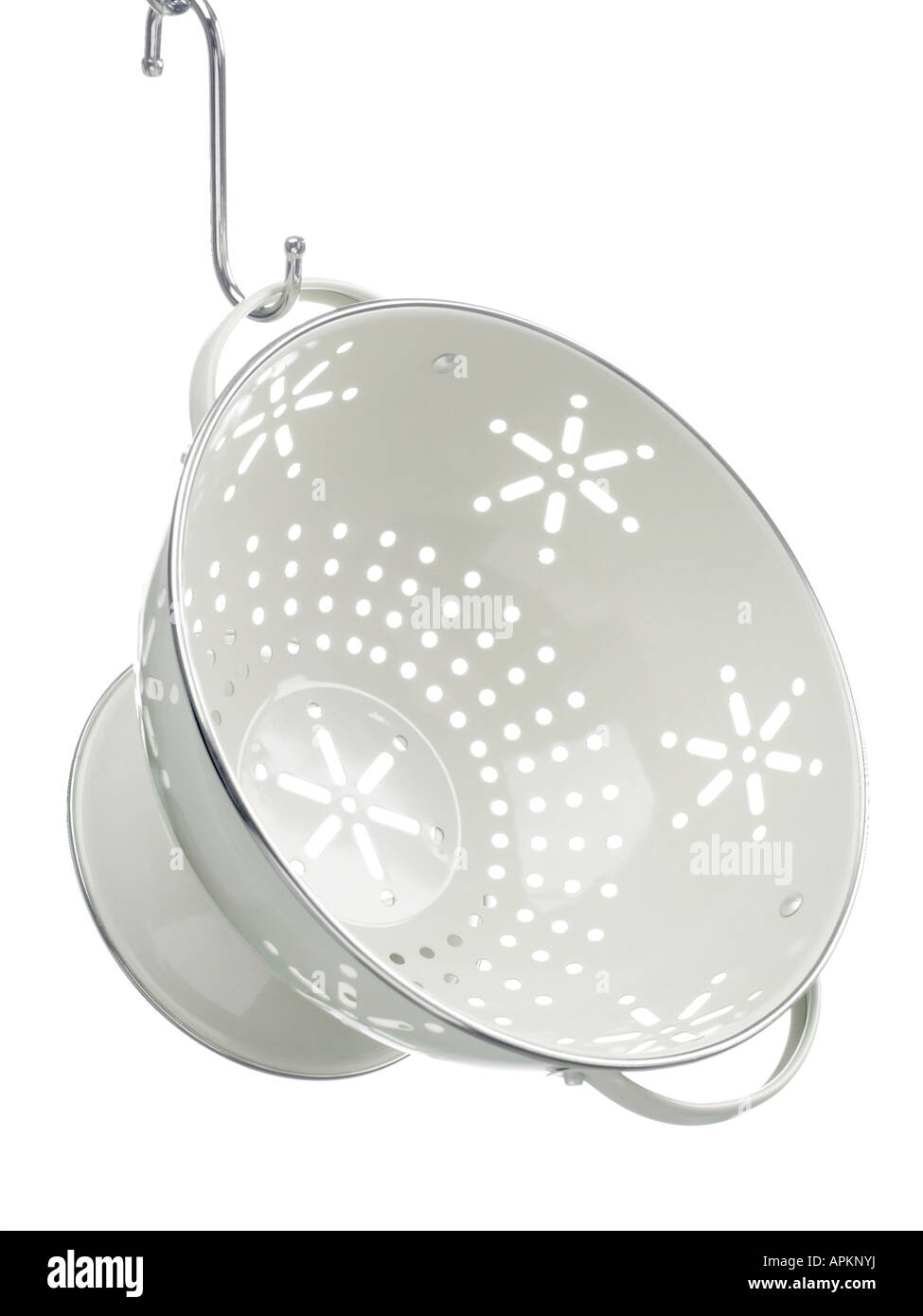 Empty colander hanging from hook Stock Photo - Alamy