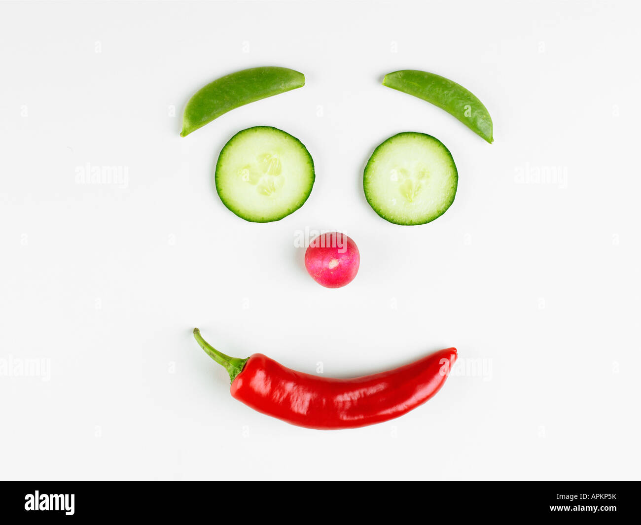 Smiley face made of vegetables (close-up Stock Photo - Alamy