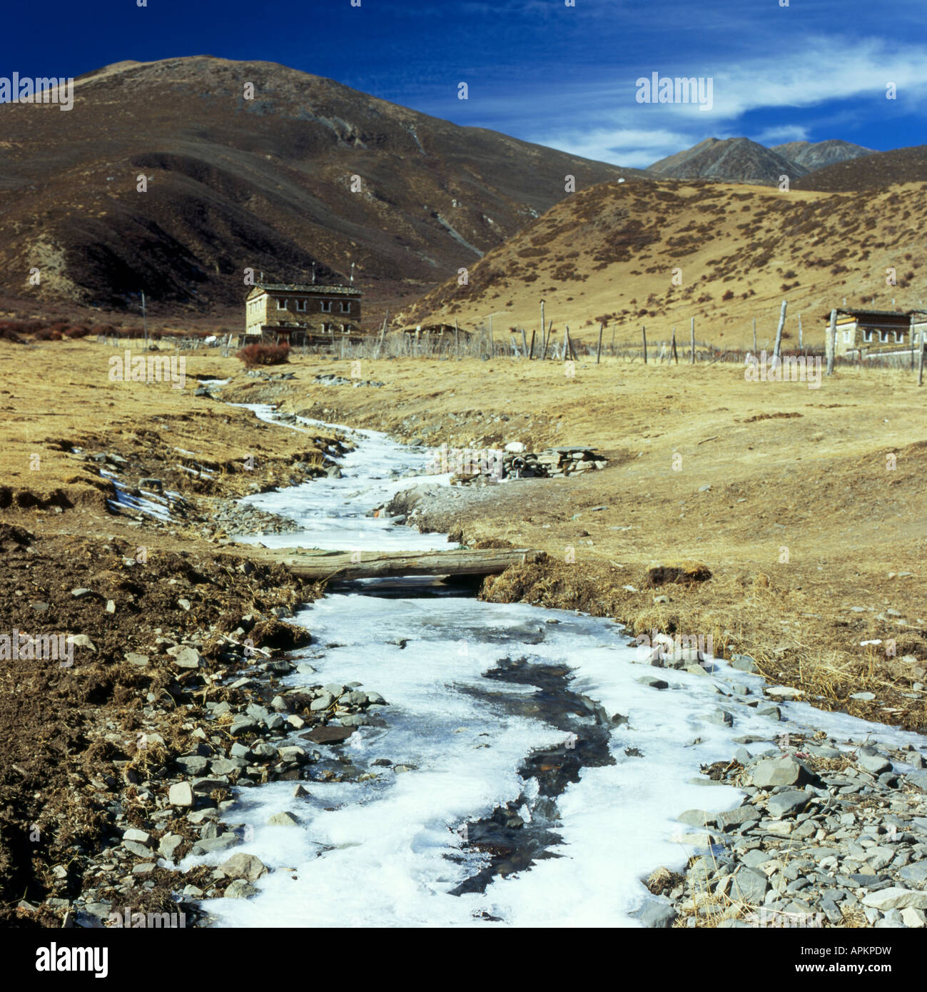 tibetan farming house at a mountain creek in the region Kham, China ...