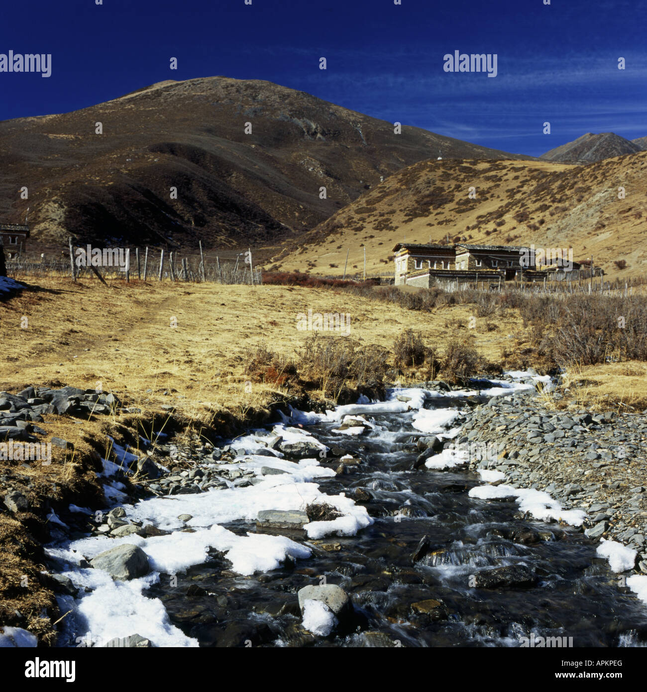 tibetan farming house at a mountain creek in the region Kham, China ...