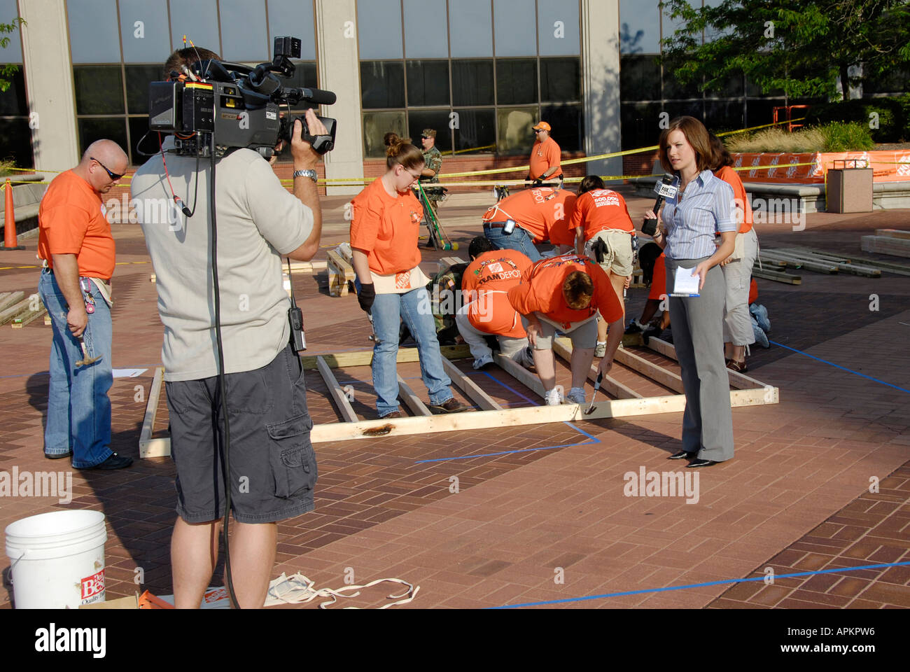 TV Television crew does a live interview news story about the ...