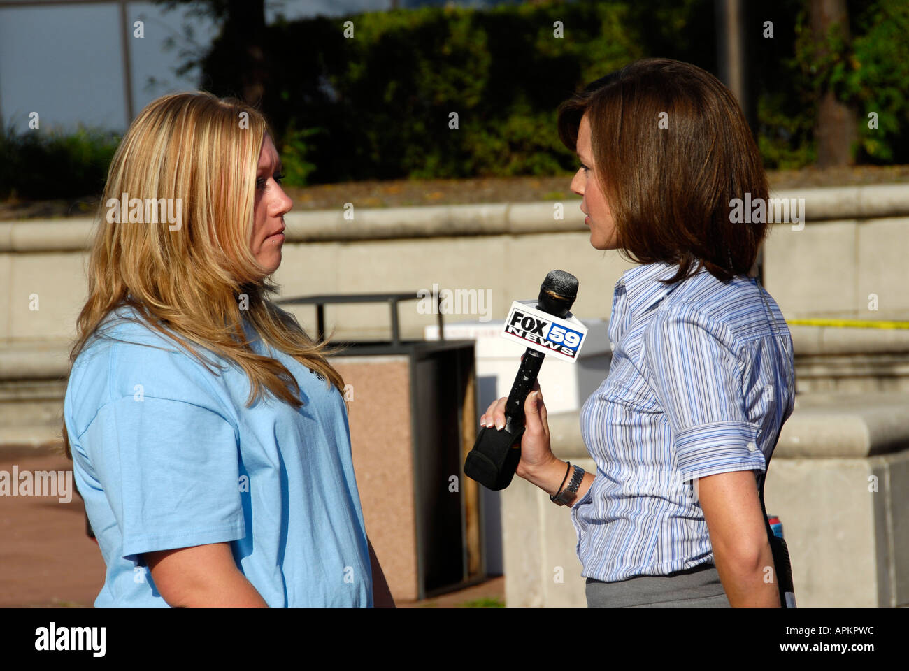TV Television crew does a live interview news story about the ...