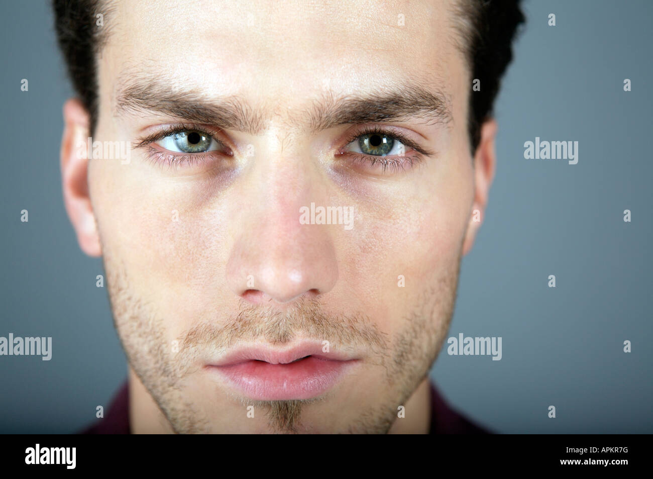 Serious man blue eye hi-res stock photography and images - Alamy