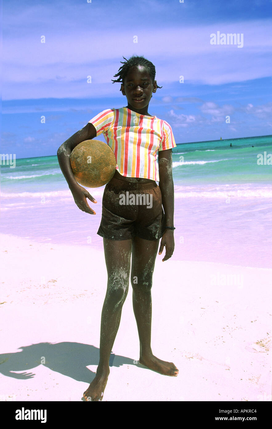 LOCAL BOY WITH FOOTBALL Stock Photo - Alamy