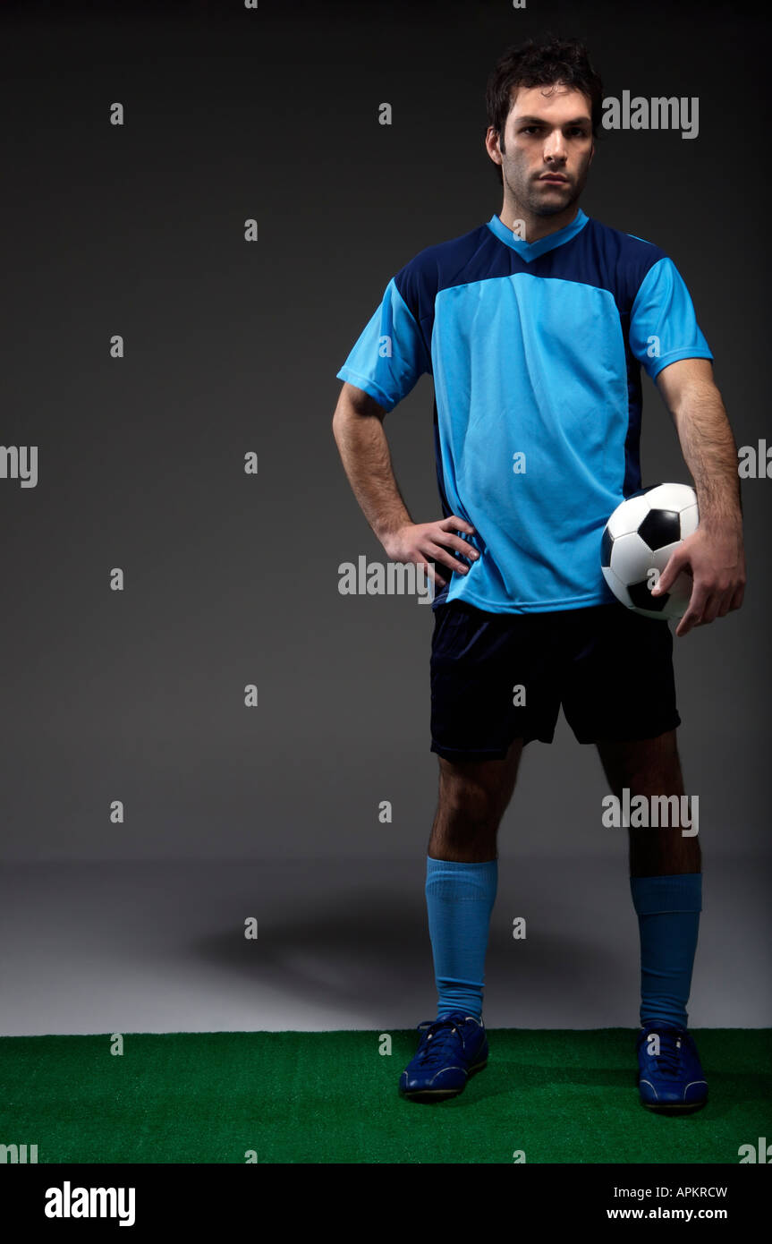 Football player with ball Stock Photo - Alamy