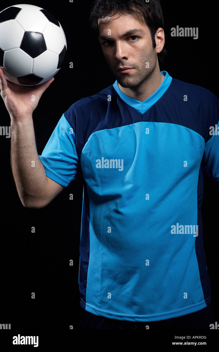 Football player with ball Stock Photo - Alamy