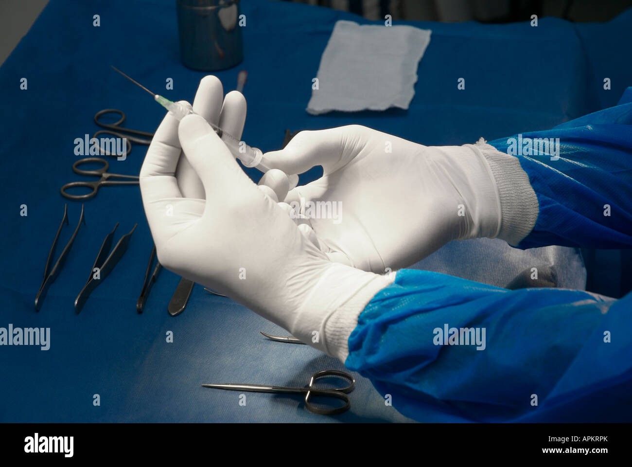 Hands in surgery room Stock Photo - Alamy