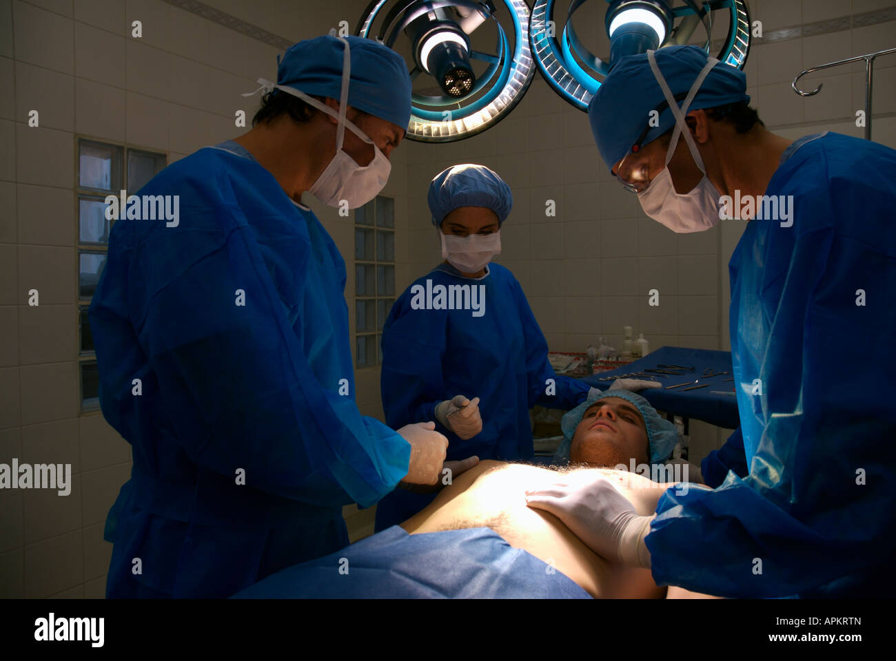 Doctors at surgery room Stock Photo - Alamy