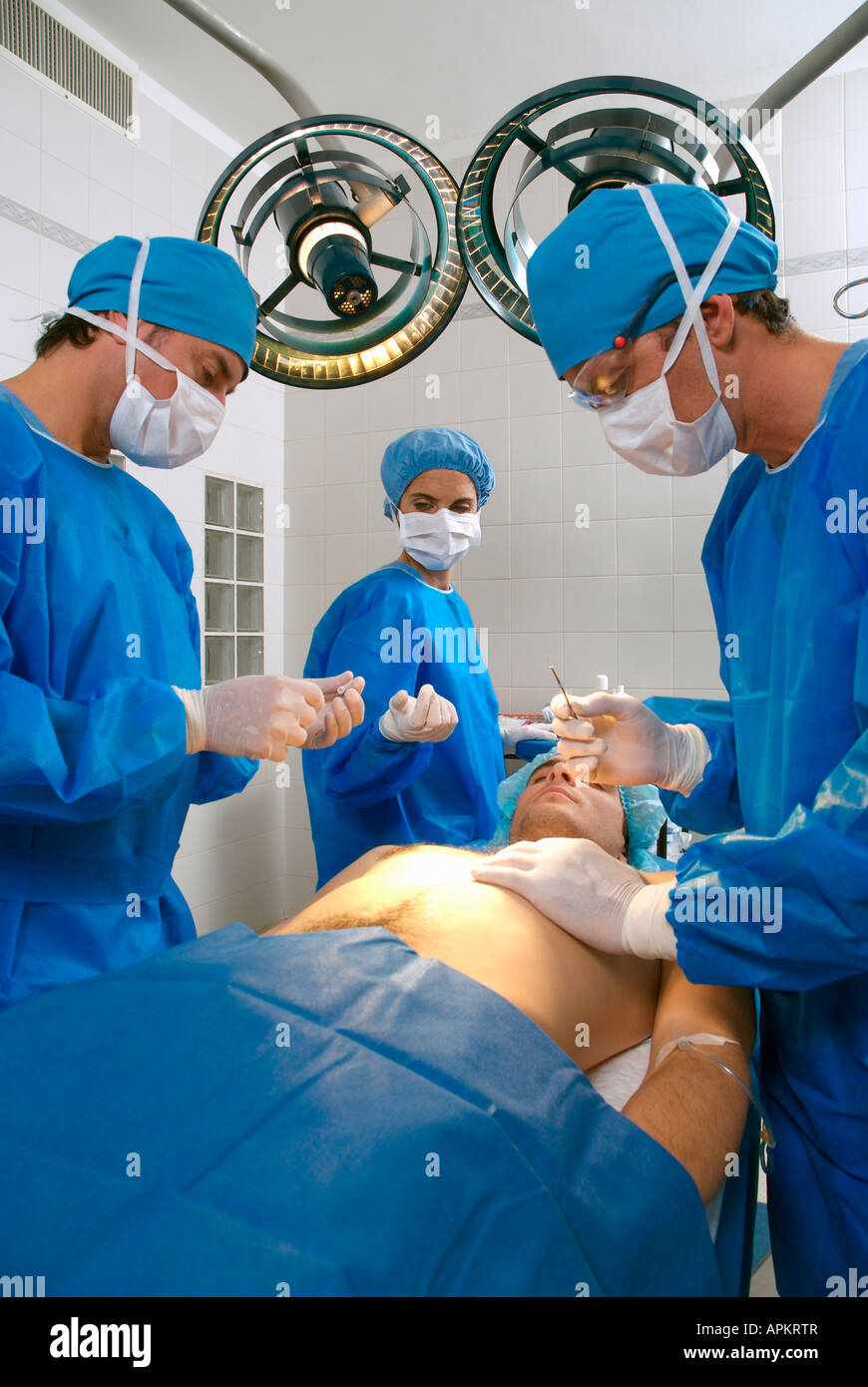 Doctors at surgery room Stock Photo - Alamy