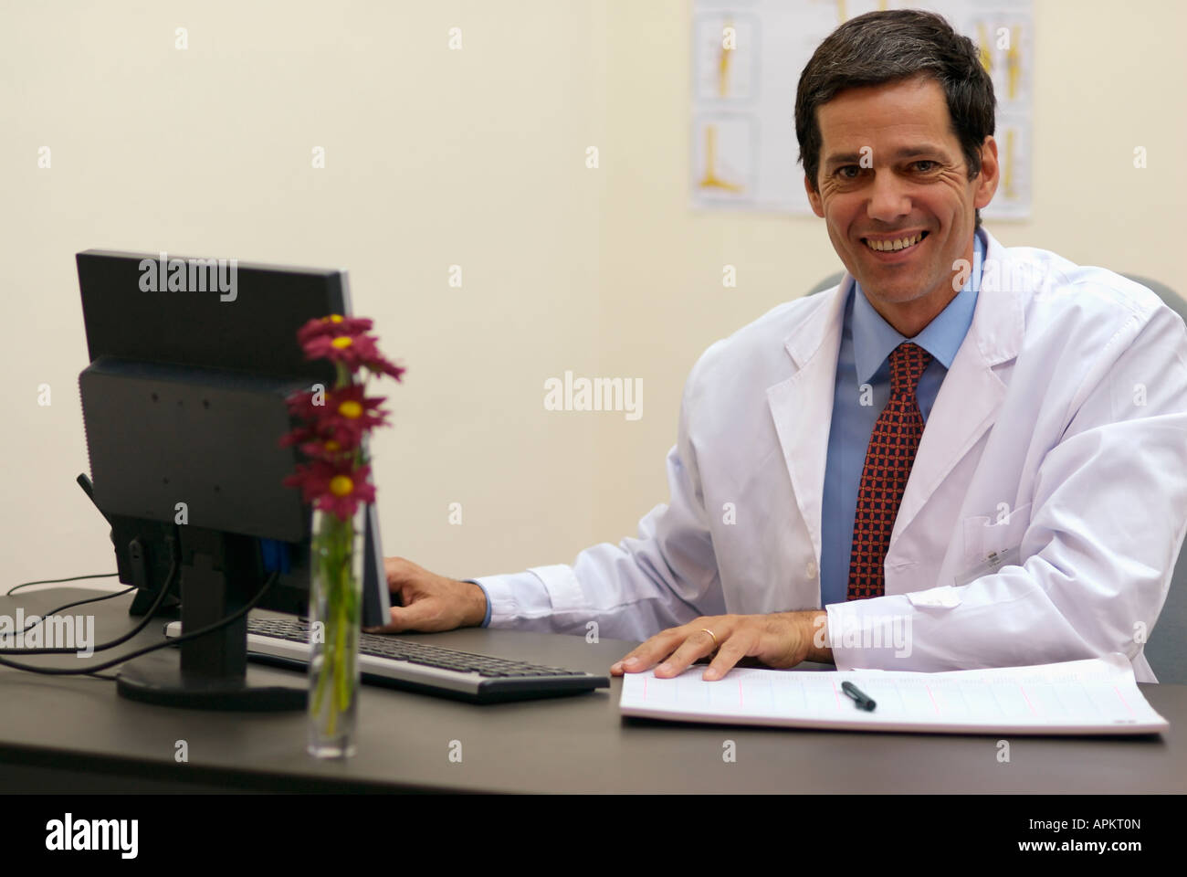 Doctor in an office Stock Photo - Alamy