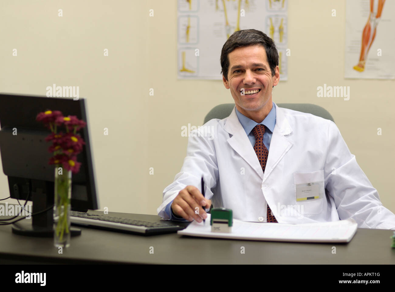 Doctor in an office Stock Photo - Alamy