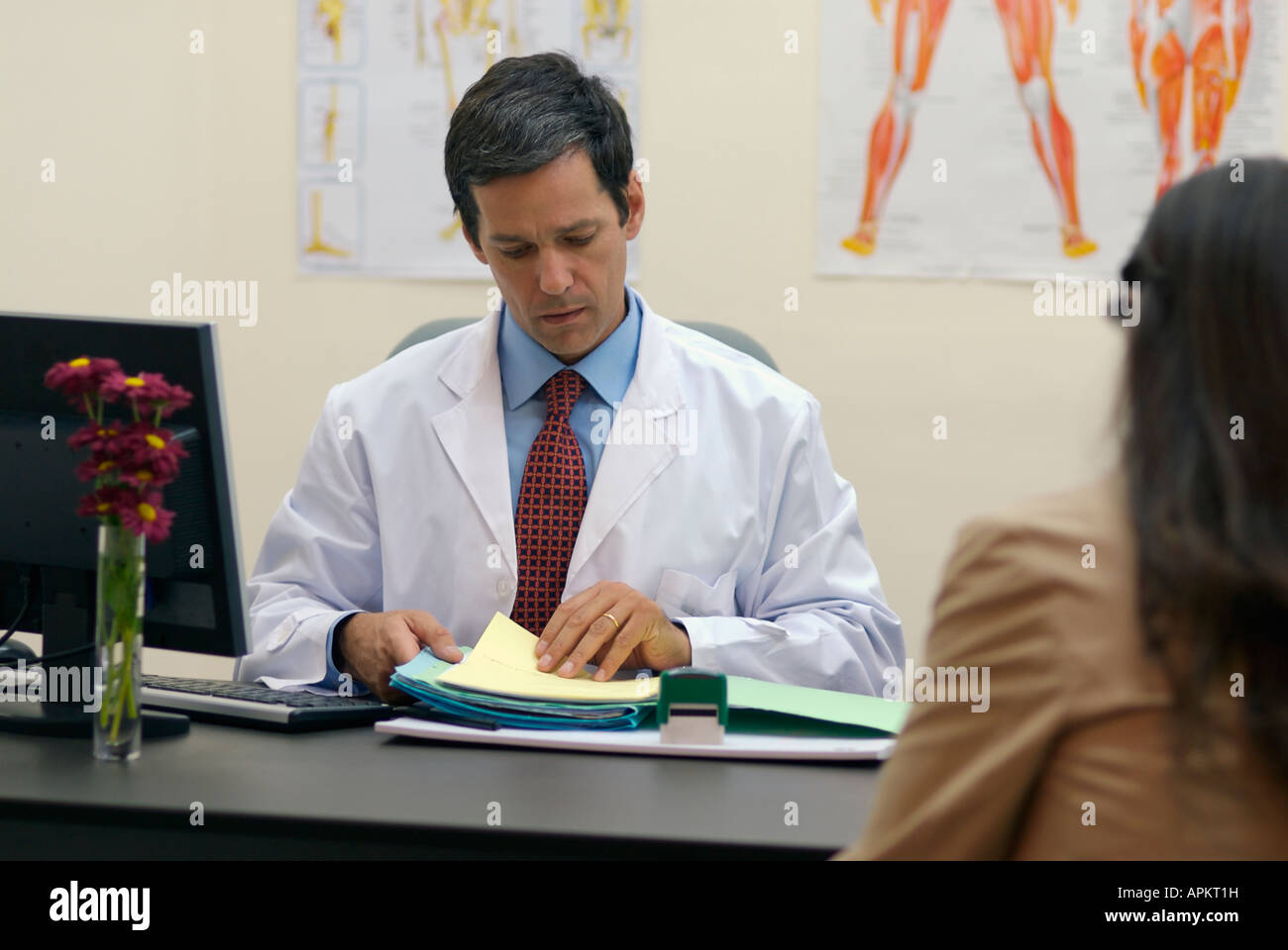 Doctor in an office Stock Photo - Alamy