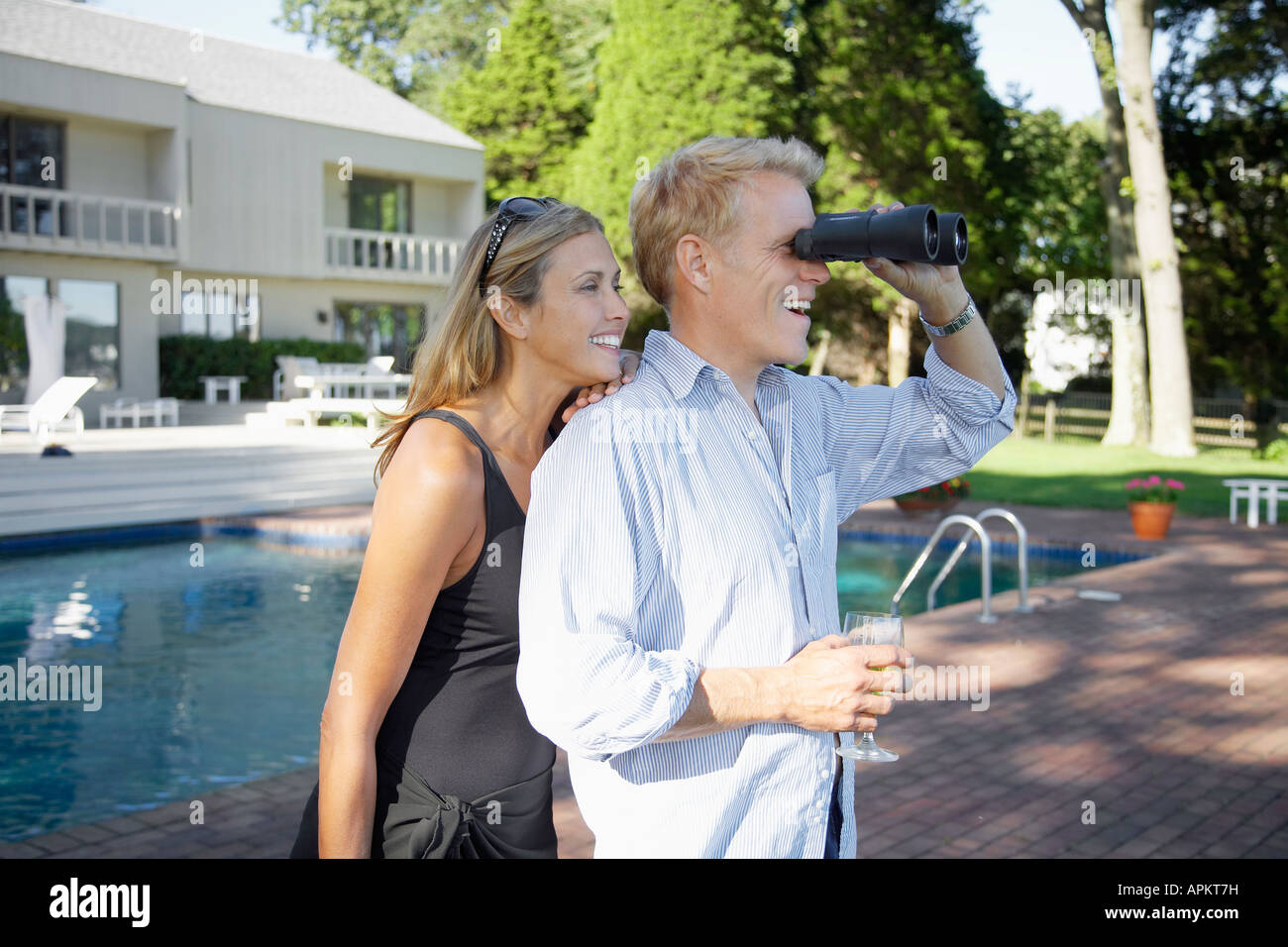 Couple using binoculars hi-res stock photography and images - Alamy