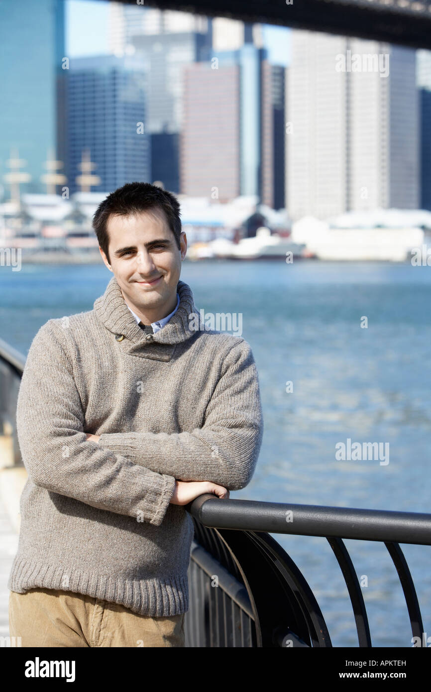 Man leaning on railing (portrait), New York City, New York, USA Stock ...