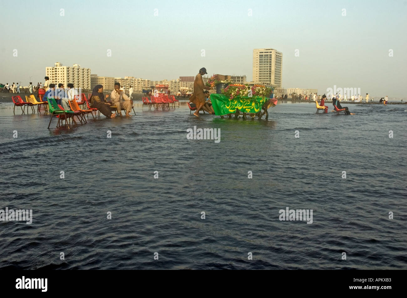 A beach stall selling food and snacks seen from the sea on a beach in ...
