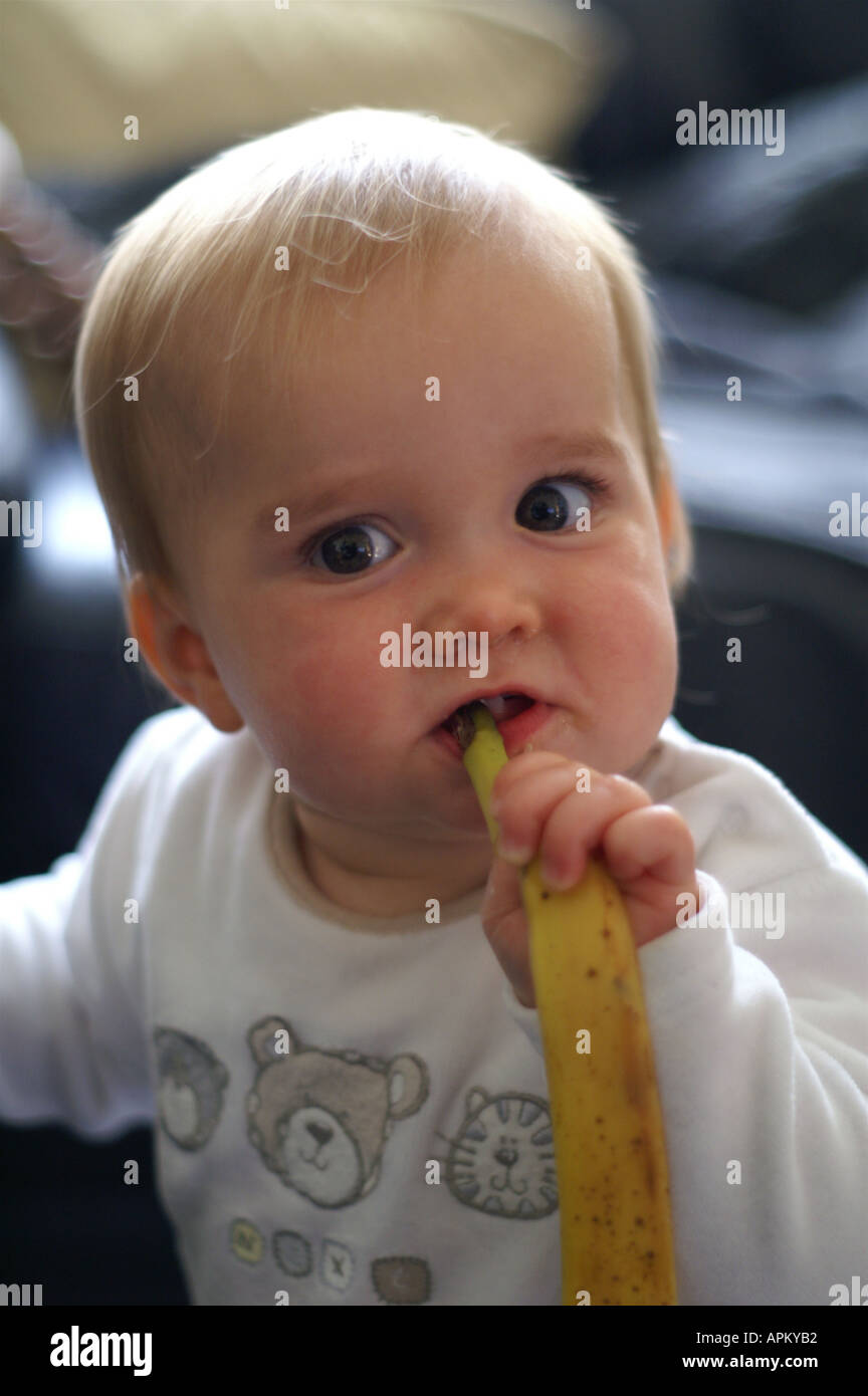 Beautiful Baby Esme Eating a Banana Stock Photo - Alamy