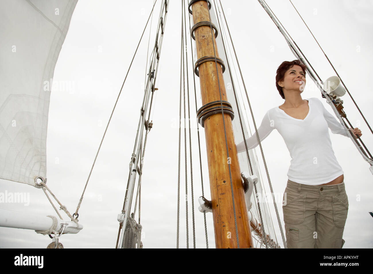 Woman standing in sailing boat (low angle view Stock Photo - Alamy