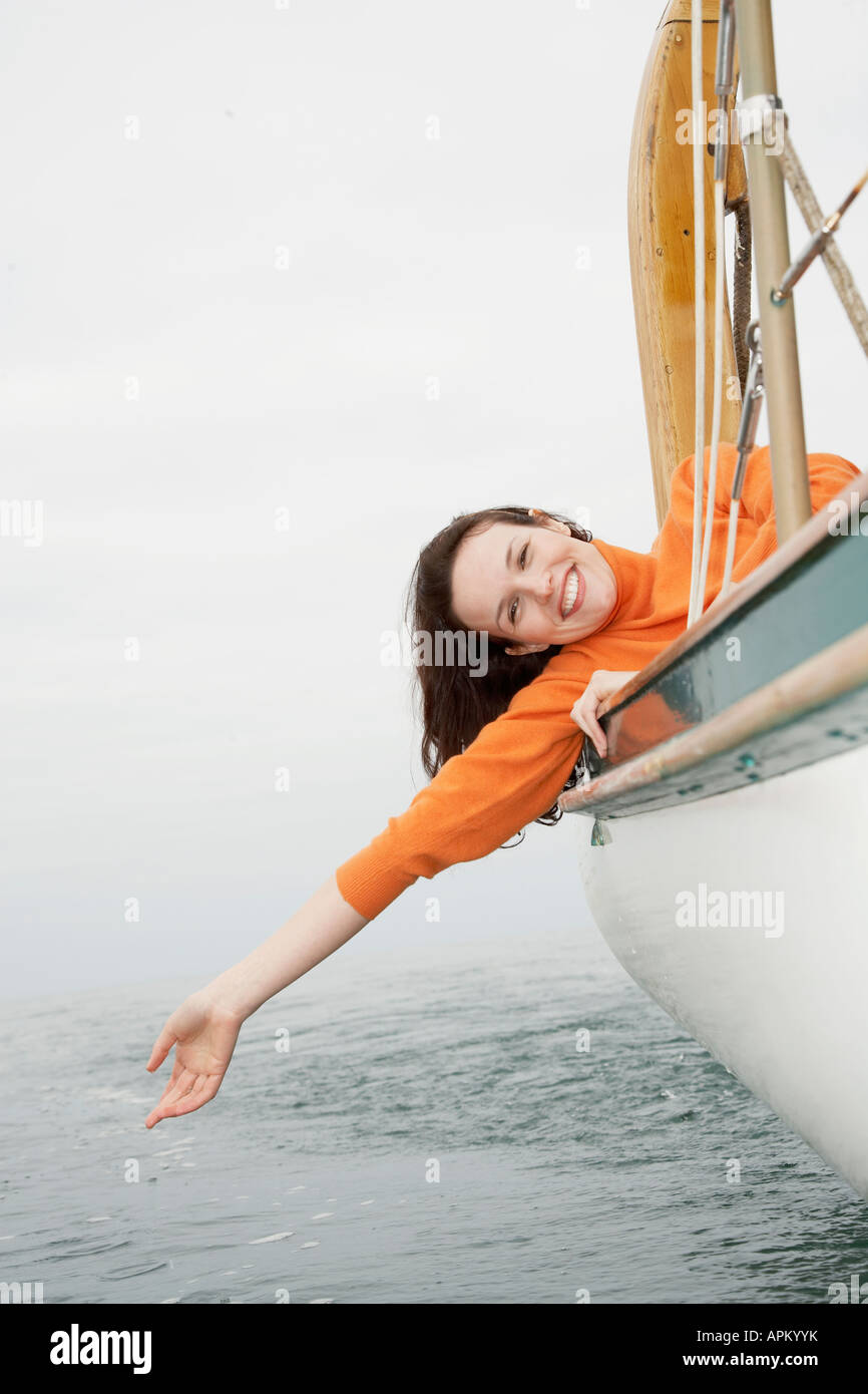 Young woman leaning over side (portrait Stock Photo - Alamy