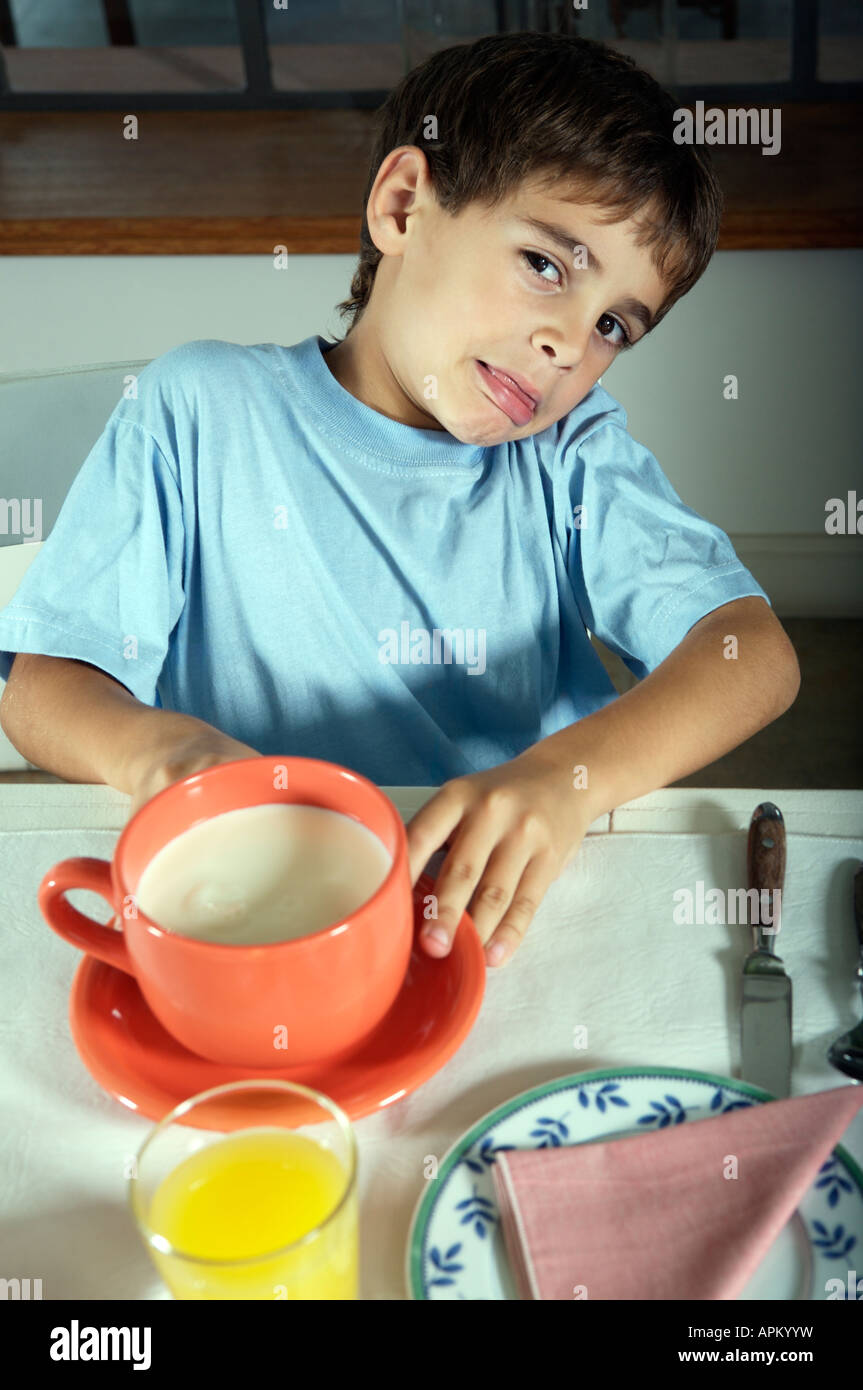 Little boy at breakfast Stock Photo - Alamy