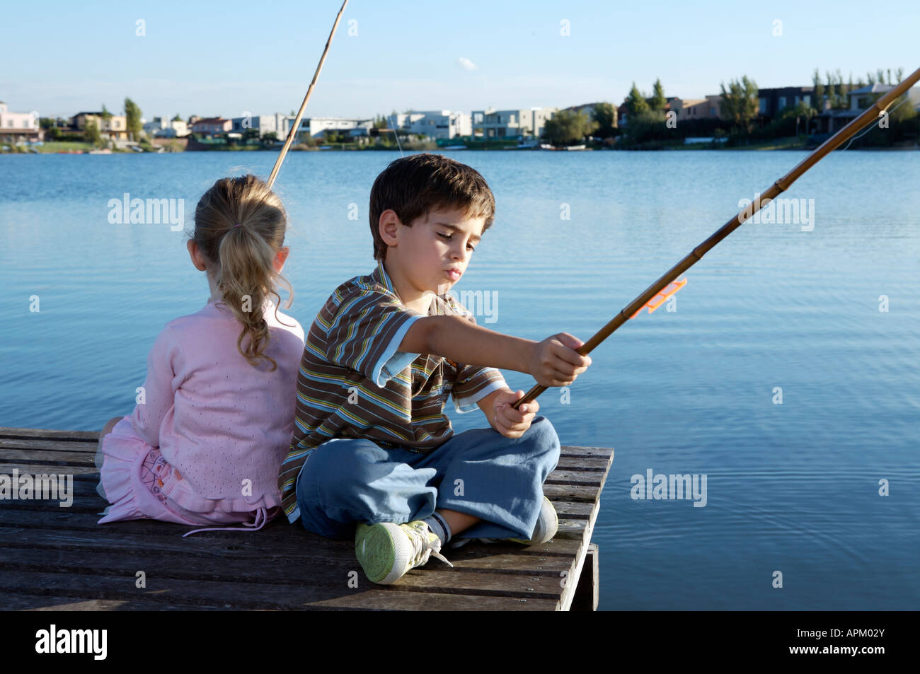 Two Boys Fishing High Resolution Stock Photography and Images - Alamy
