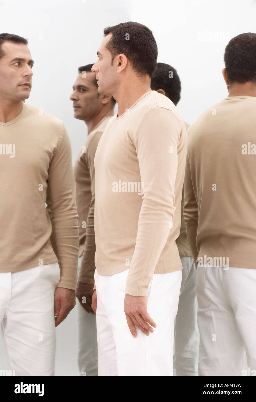 Man standing by mirrors Stock Photo - Alamy