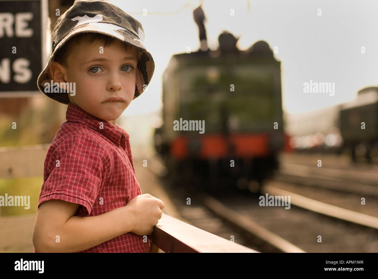 Boy by steam train, Toddington, Gloucestershire Stock Photo - Alamy