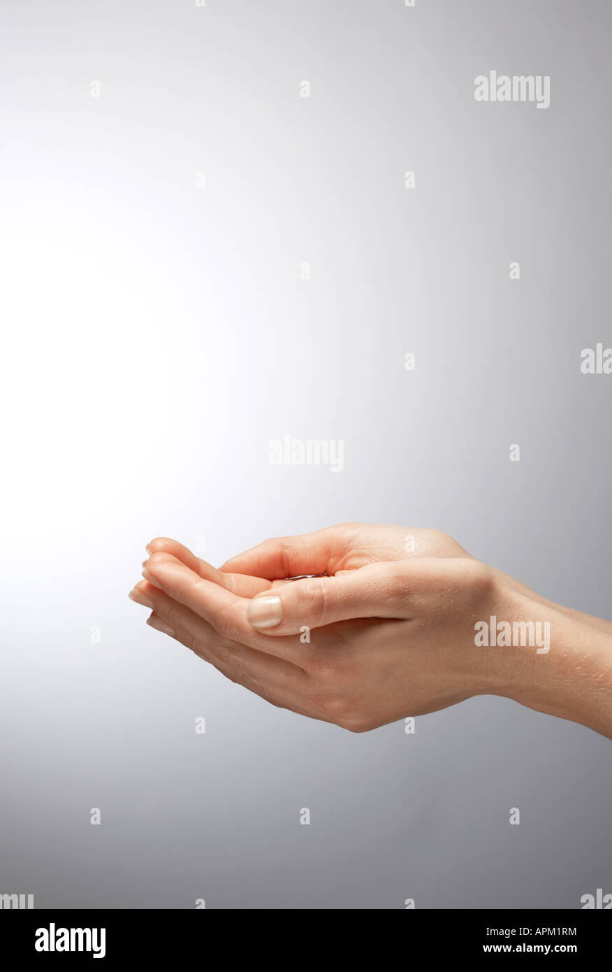 Cupped hands, close-up Stock Photo - Alamy