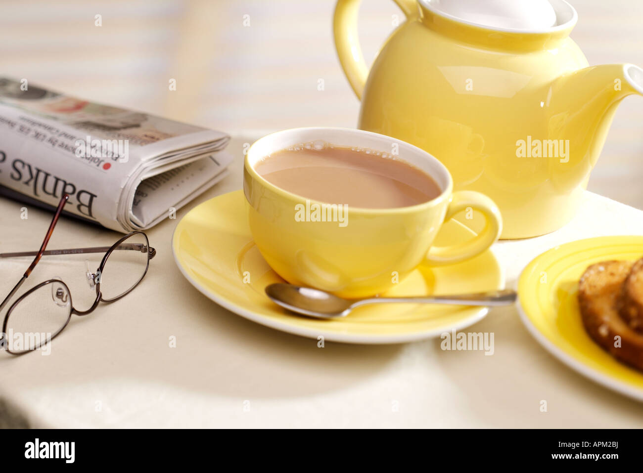 Tea and a paper Stock Photo - Alamy