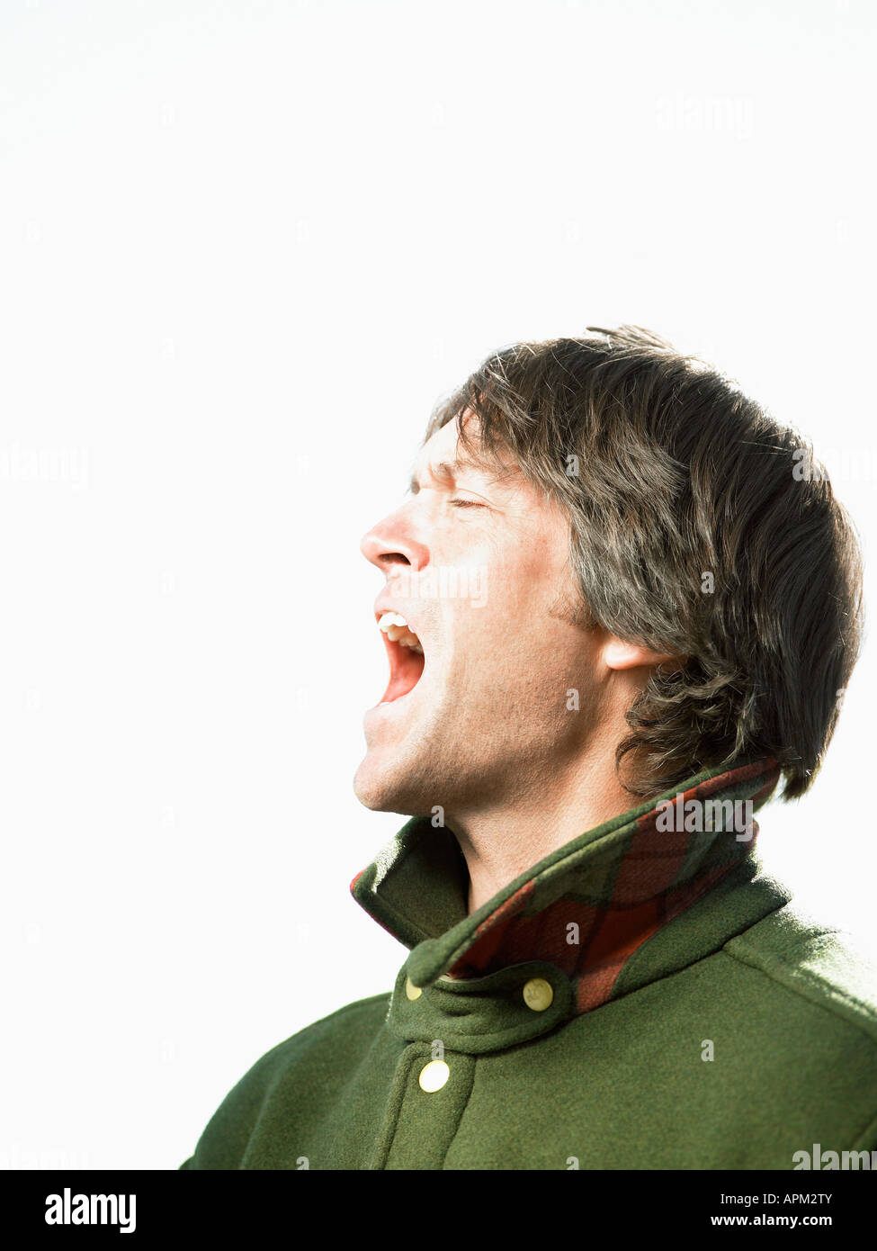 Mid adult man shouting Stock Photo - Alamy