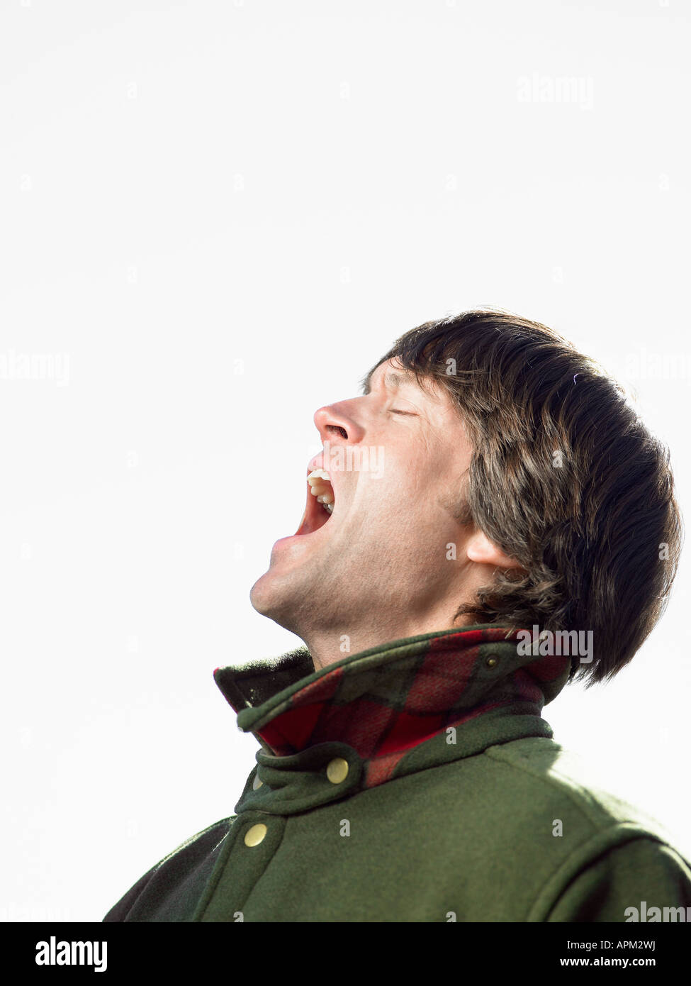 Mid adult man shouting Stock Photo - Alamy