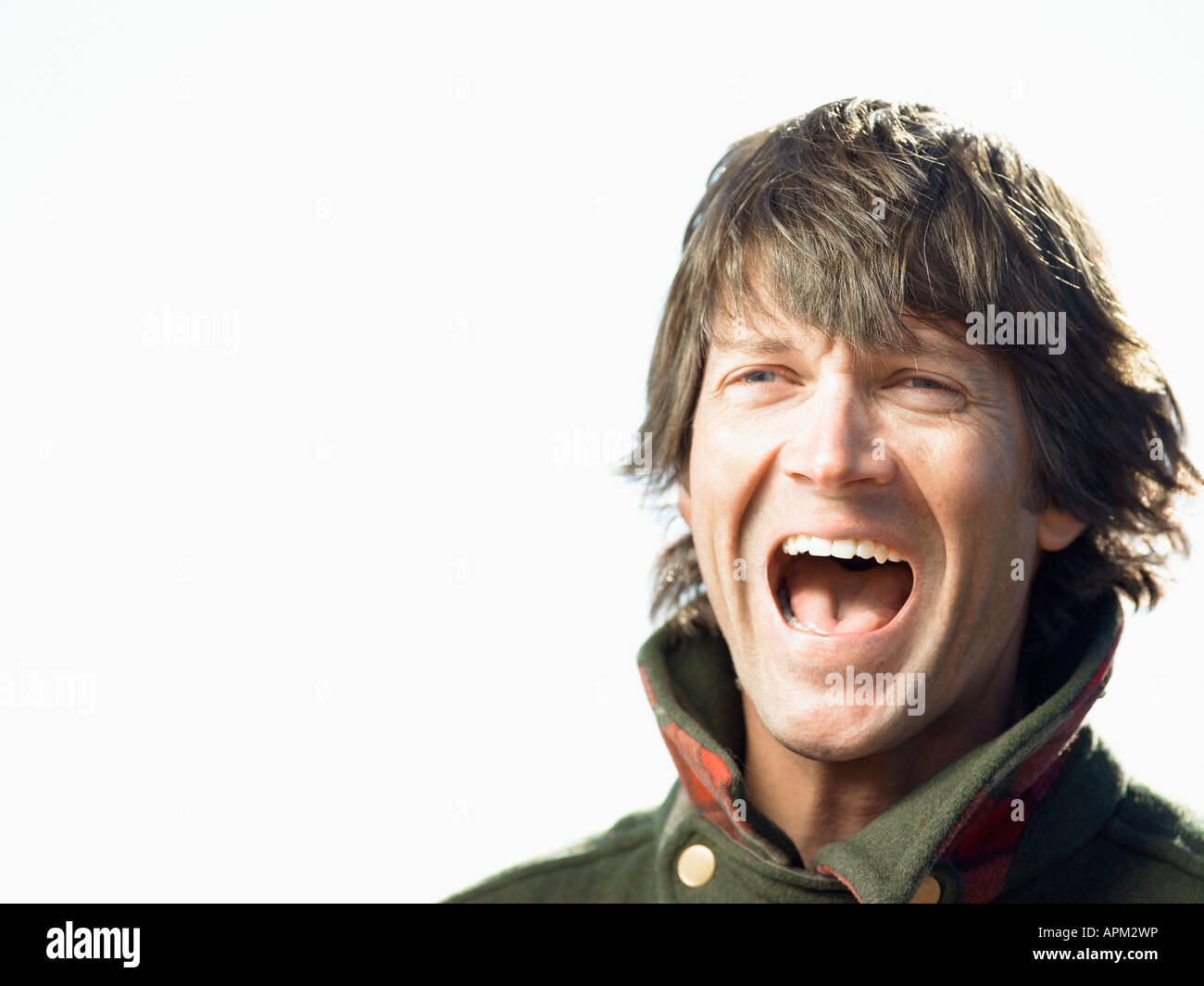 Mid adult man shouting Stock Photo - Alamy