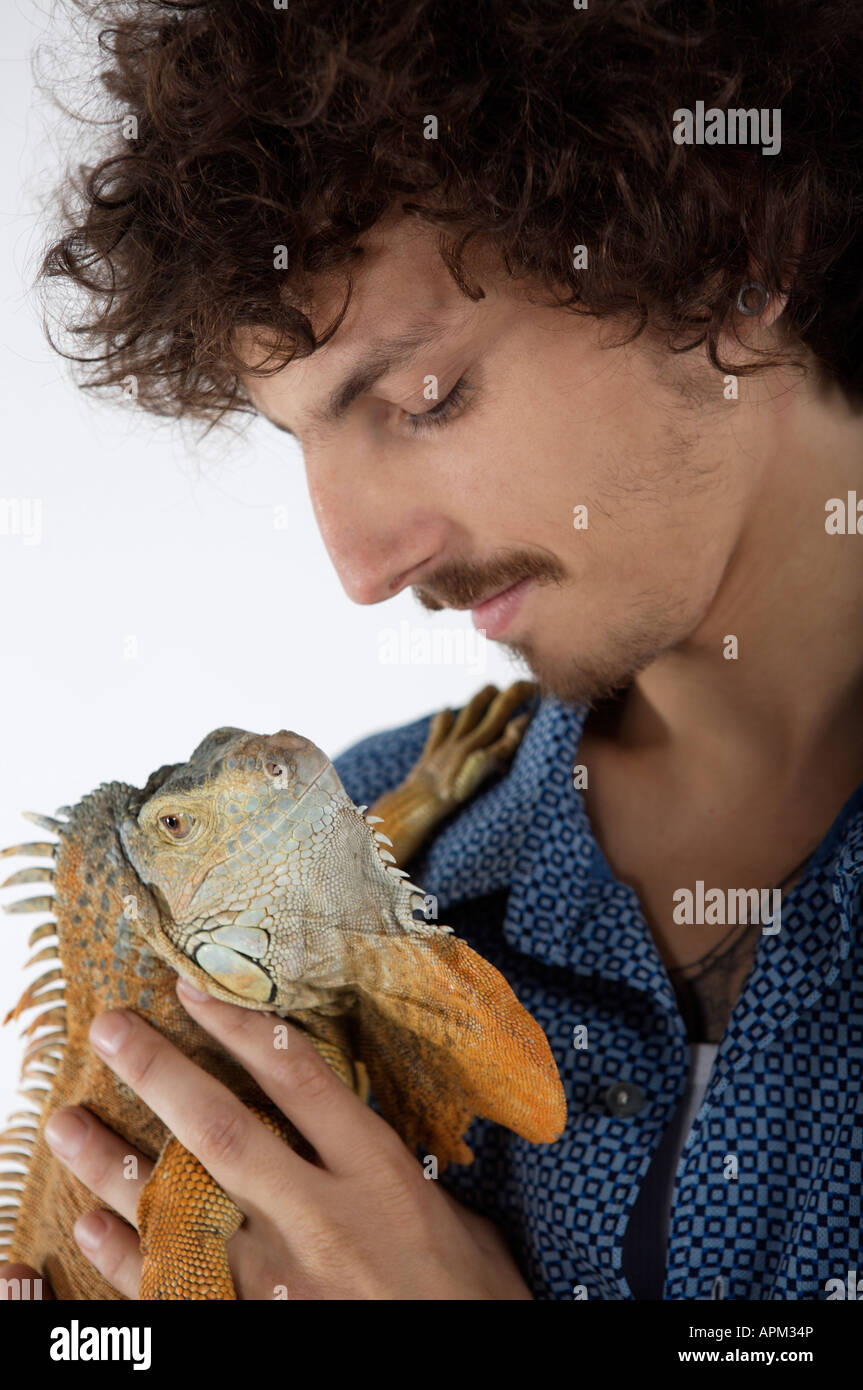 Man with Iguana Stock Photo - Alamy