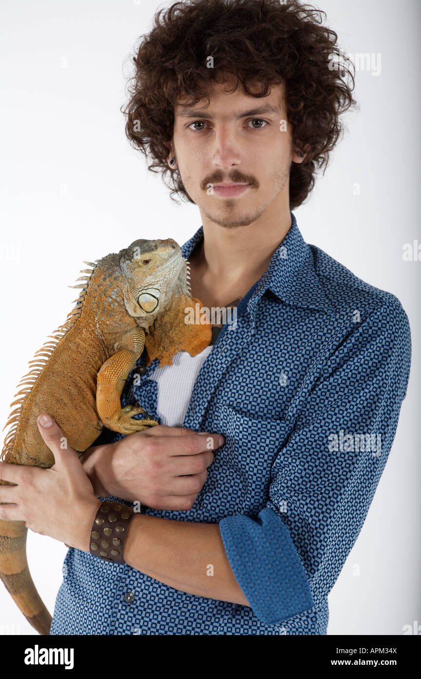 Man with Iguana Stock Photo - Alamy