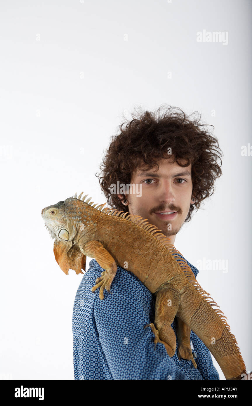 Man with Iguana Stock Photo - Alamy