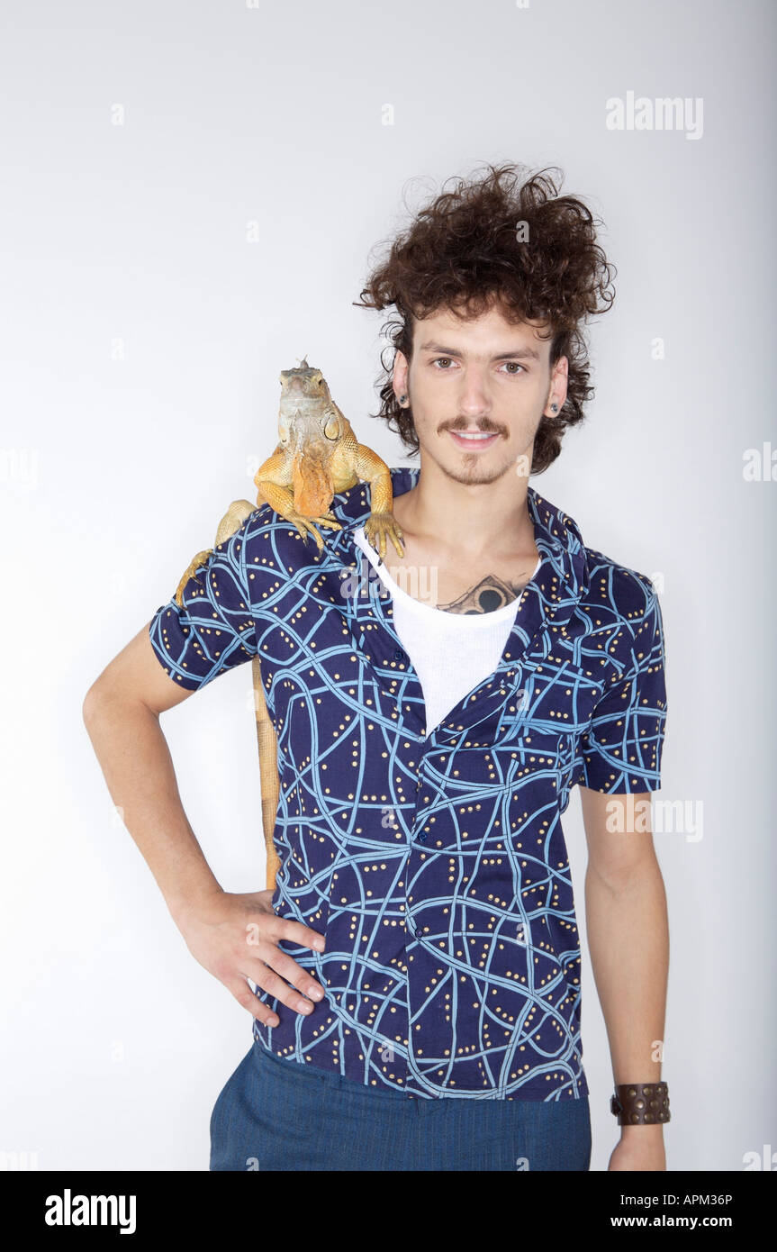 Man with Iguana Stock Photo - Alamy