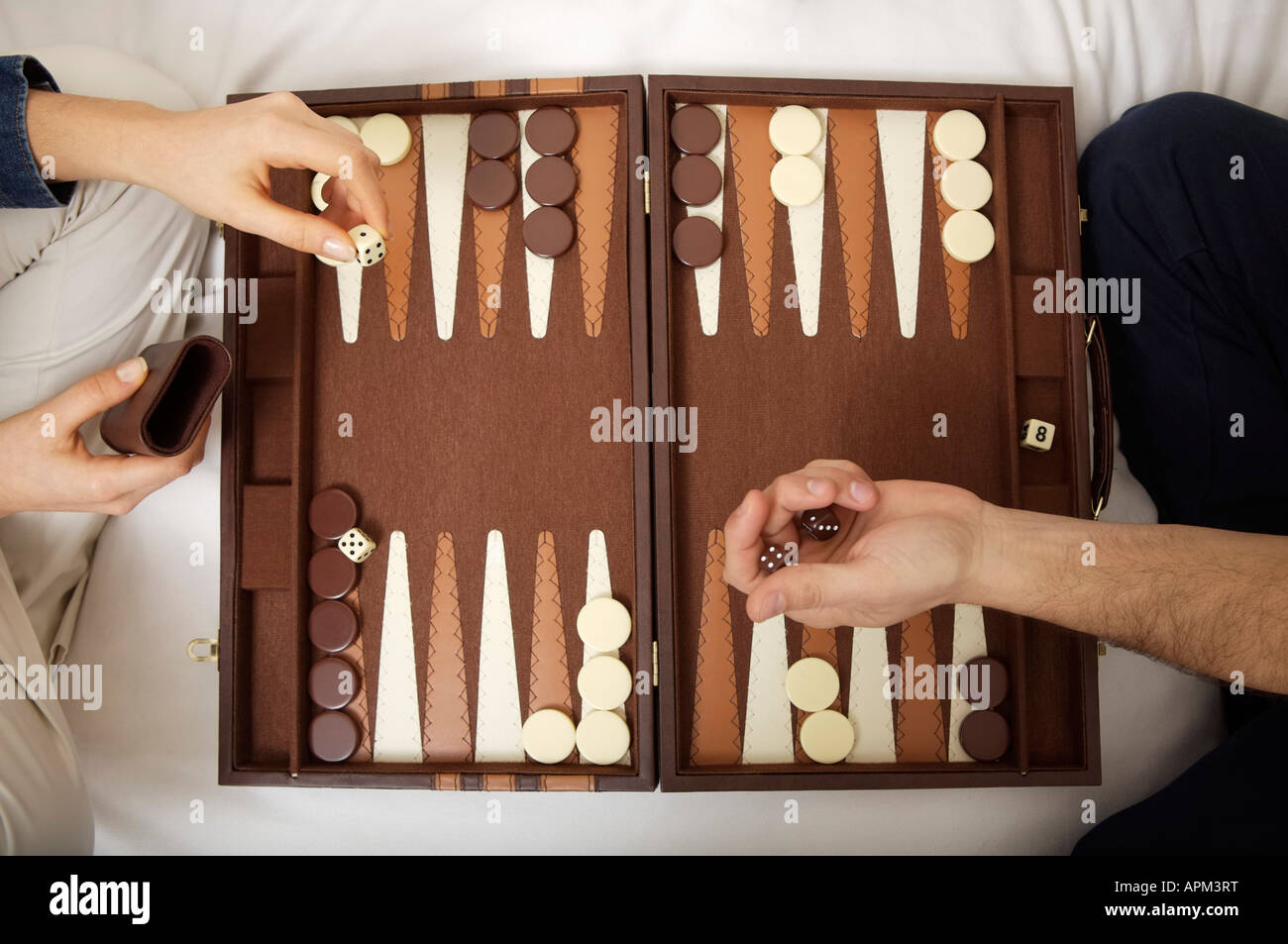 Couple playing Backgammon Stock Photo - Alamy