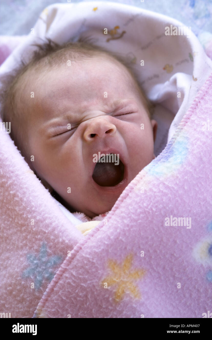 Yawning infant hi-res stock photography and images - Alamy