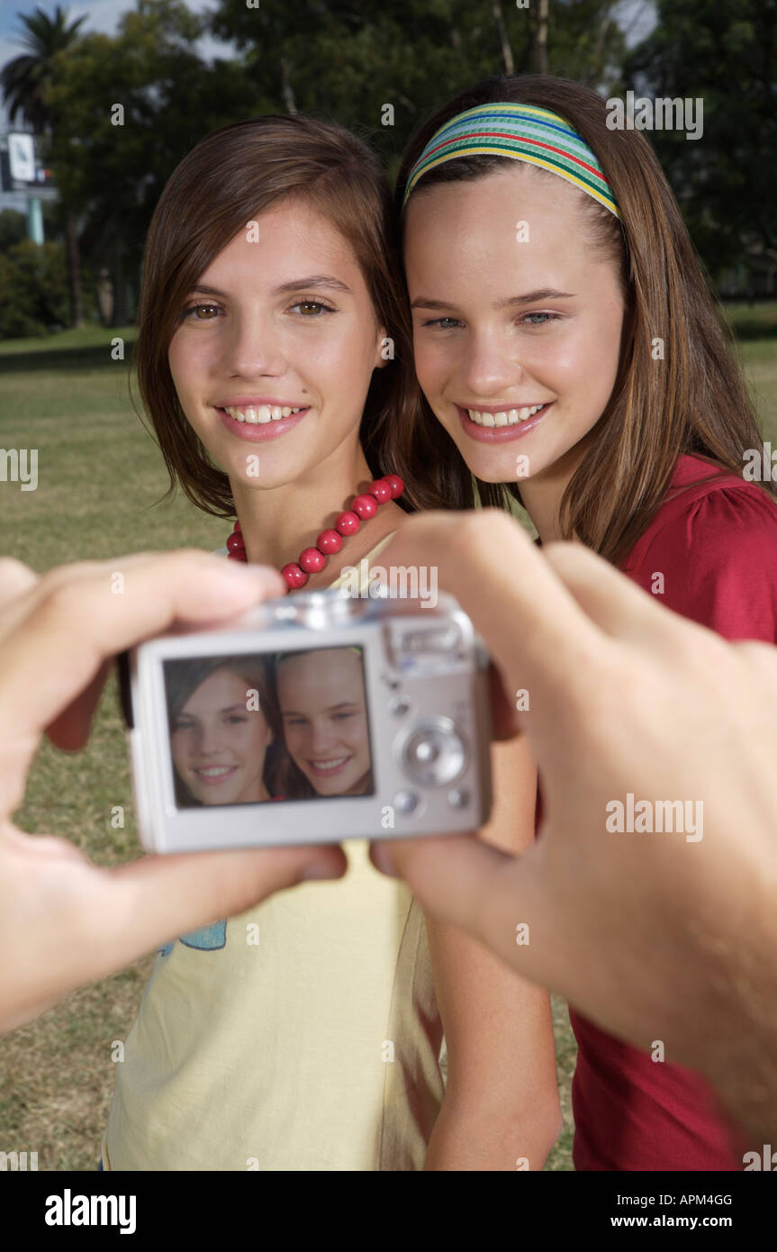 Male Teenager taking pictures with digital camera Stock Photo - Alamy