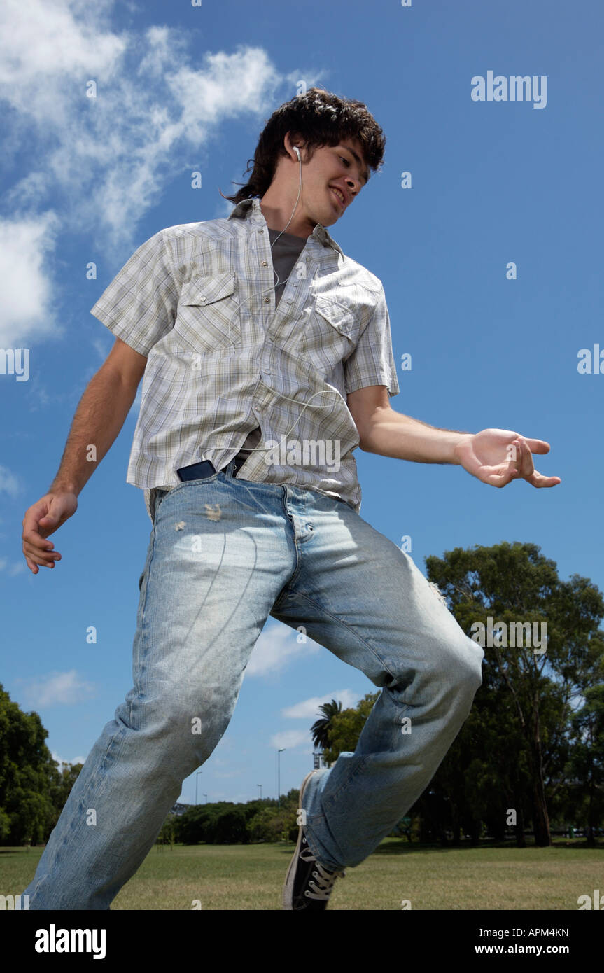 Boy dancing in a park Stock Photo - Alamy