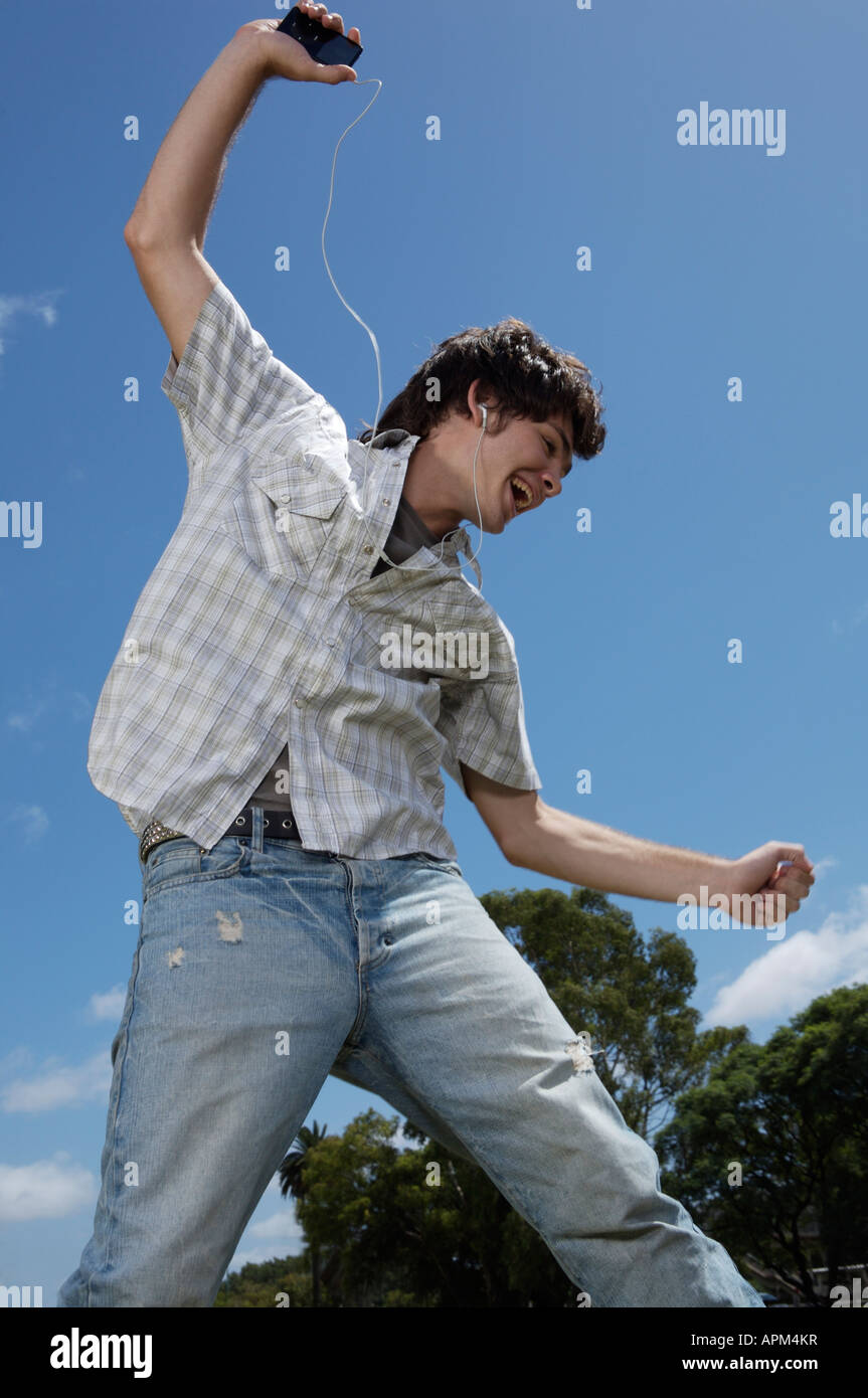 Boy dancing in a park Stock Photo - Alamy