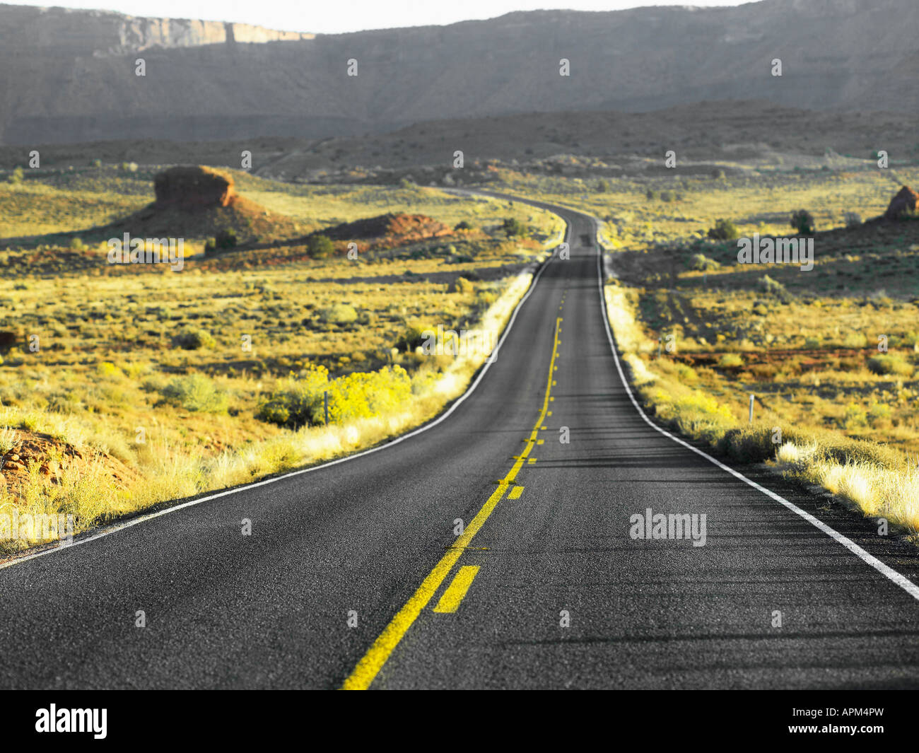Empty highway running through desert, Moab, Utah, USA Stock Photo - Alamy